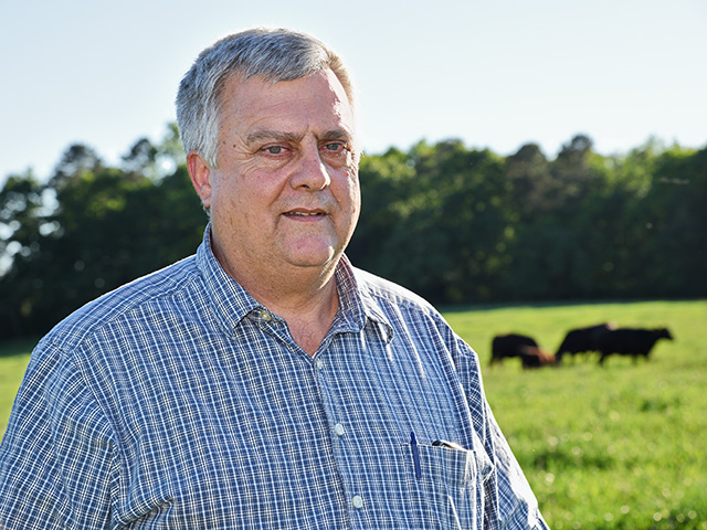 This cattleman fuels his herd with high-quality, high-moisture hay.